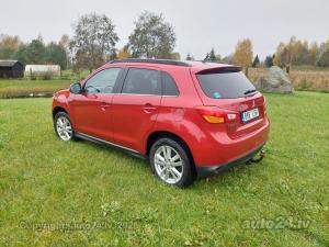 Sarkans Mitsubishi ASX 2013 Viljandi, ar dzinēja tilpumu 2.30 L un nobraukumu 83 tūkst. km par 12000 €, foto 4 vietnē AUTOMOTO.COM.LV