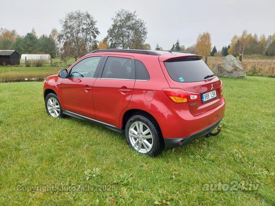 Sarkans Mitsubishi ASX 2013 Viljandi, ar dzinēja tilpumu 2.30 L un nobraukumu 83 tūkst. km par 12000 €, foto 4 vietnē AUTOMOTO.COM.LV