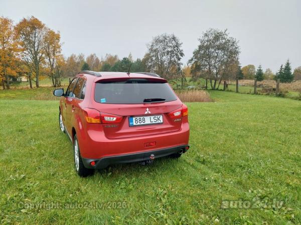 Sarkans Mitsubishi ASX 2013 Viljandi, ar dzinēja tilpumu 2.30 L un nobraukumu 83 tūkst. km par 12000 €, foto 4 vietnē AUTOMOTO.COM.LV
