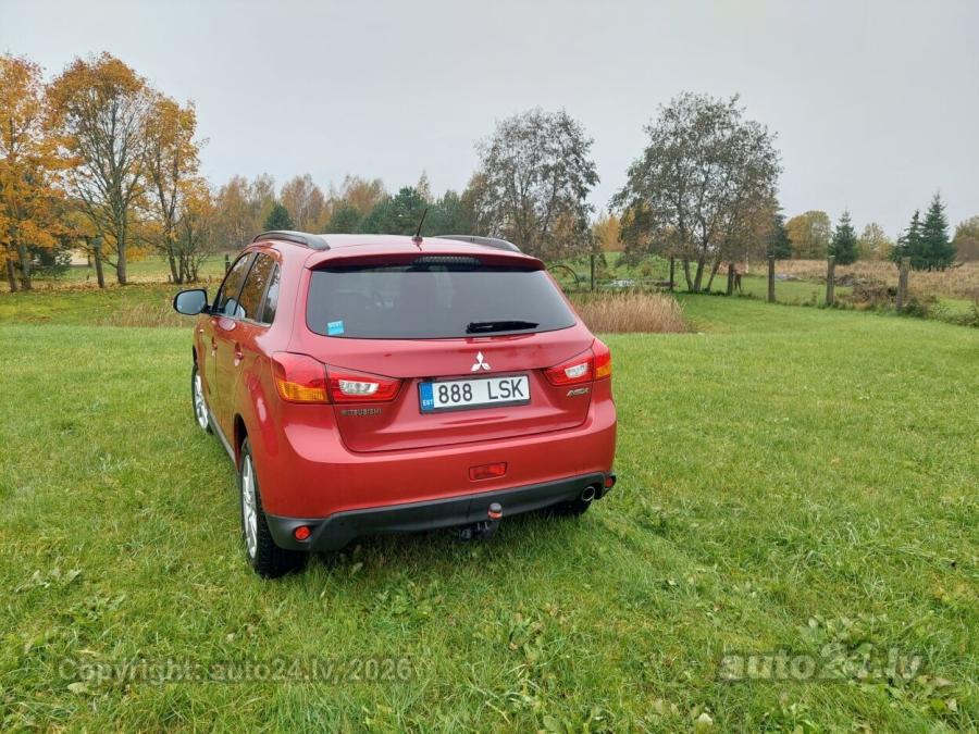 Sarkans Mitsubishi ASX 2013 Viljandi, ar dzinēja tilpumu 2.30 L un nobraukumu 83 tūkst. km par 12000 €, foto 5 vietnē AUTOMOTO.COM.LV