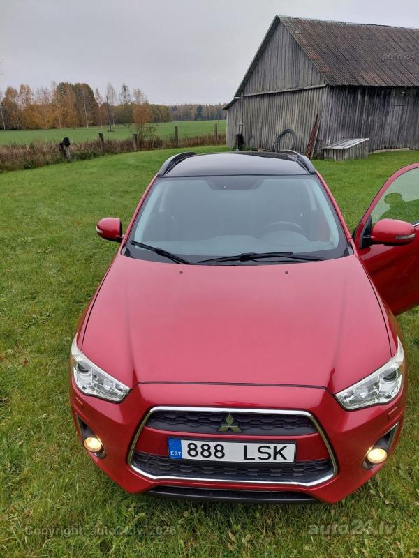 Sarkans Mitsubishi ASX 2013 Viljandi, ar dzinēja tilpumu 2.30 L un nobraukumu 83 tūkst. km par 12000 €, foto 6 vietnē AUTOMOTO.COM.LV