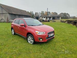 Sarkans Mitsubishi ASX 2013 Viljandi, ar dzinēja tilpumu 2.30 L un nobraukumu 83 tūkst. km par 12000 €, foto 14 vietnē AUTOMOTO.COM.LV