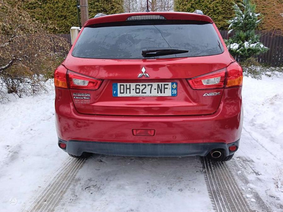 Red Mitsubishi ASX 2014 in Panevezys, with an engine capacity of 1.80 L and mileage of 246 thousand km for 5900 €, photo 5 on AUTOMOTO.COM.LV