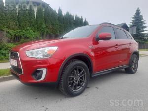 Red Mitsubishi ASX 2015 in Riga, with an engine capacity of 2.20 L and mileage of 206 thousand km for 9990 €, photo 3 on AUTOMOTO.COM.LV