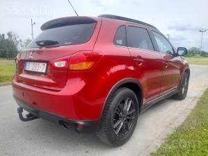 Red Mitsubishi ASX 2015 in Riga, with an engine capacity of 2.20 L and mileage of 206 thousand km for 9990 €, photo 6 on AUTOMOTO.COM.LV