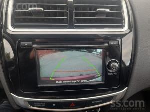 Red Mitsubishi ASX 2015 in Riga, with an engine capacity of 2.20 L and mileage of 206 thousand km for 9990 €, photo 11 on AUTOMOTO.COM.LV