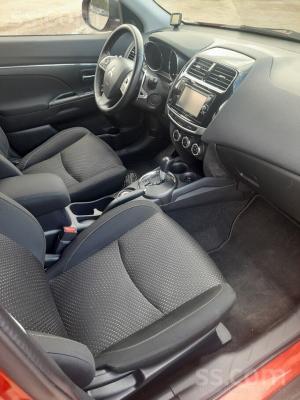 Red Mitsubishi ASX 2015 in Riga, with an engine capacity of 2.20 L and mileage of 206 thousand km for 9990 €, photo 12 on AUTOMOTO.COM.LV