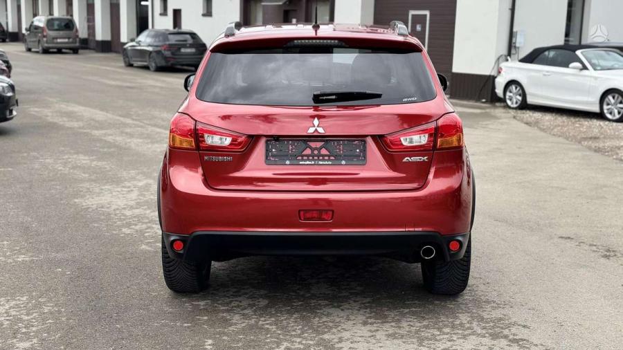Red Mitsubishi ASX 2015 in Telschi, with an engine capacity of 2.27 L and mileage of 185 thousand km for 8900 €, photo 9 on AUTOMOTO.COM.LV
