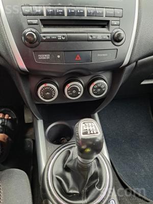 Red Mitsubishi ASX 2011 in Balvi, with an engine capacity of 1.80 L and mileage of 251 thousand km for 5200 €, photo 9 on AUTOMOTO.COM.LV