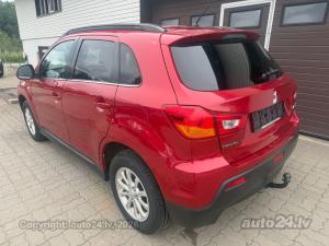 Sarkans Mitsubishi ASX 2012 Veru, ar dzinēja tilpumu 1.80 L un nobraukumu 287 tūkst. km par 4290 €, foto 5 vietnē AUTOMOTO.COM.LV
