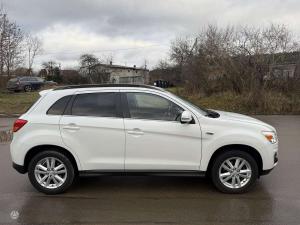White Mitsubishi ASX 2013 in Vilnius, with an engine capacity of 2.27 L and mileage of 153 thousand km for 5900 €, photo 4 on AUTOMOTO.COM.LV
