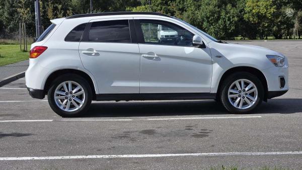 White Mitsubishi ASX 2013 in Panevezys, with an engine capacity of 2.27 L and mileage of 194 thousand km for 6000 €, photo 7 on AUTOMOTO.COM.LV