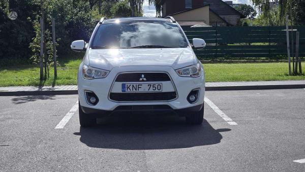 White Mitsubishi ASX 2013 in Panevezys, with an engine capacity of 2.27 L and mileage of 194 thousand km for 6000 €, photo 10 on AUTOMOTO.COM.LV