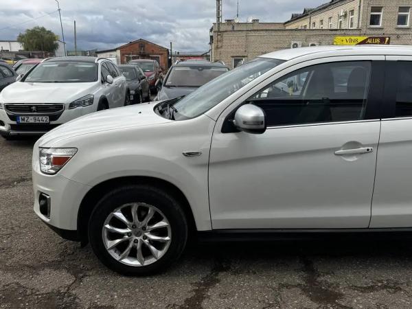 White Mitsubishi ASX 2015 in Daugavpils, with an engine capacity of 1.80 L and mileage of 161 thousand km for 7990 €, photo 7 on AUTOMOTO.COM.LV