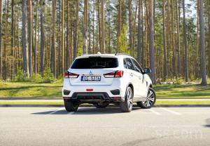 White Mitsubishi ASX 2020 in Riga, with an engine capacity of 2.00 L and mileage of 149 thousand km for 14990 €, photo 6 on AUTOMOTO.COM.LV