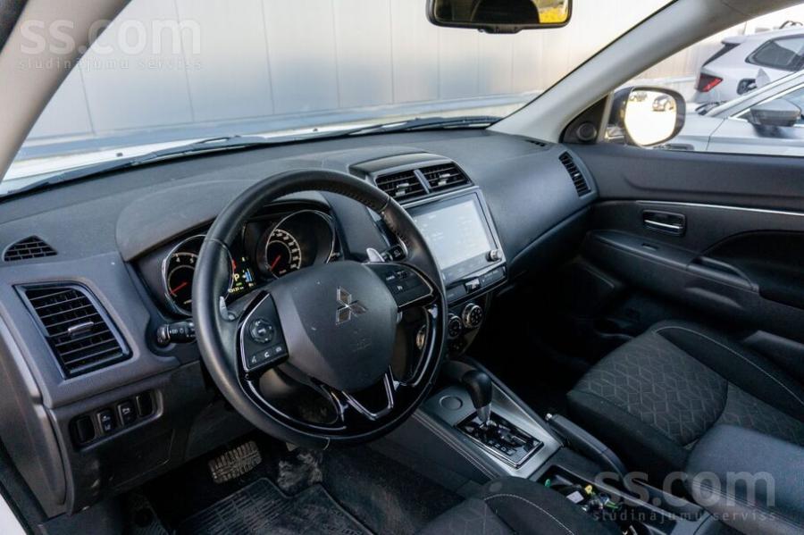 White Mitsubishi ASX 2020 in Riga, with an engine capacity of 2.00 L and mileage of 149 thousand km for 14990 €, photo 10 on AUTOMOTO.COM.LV