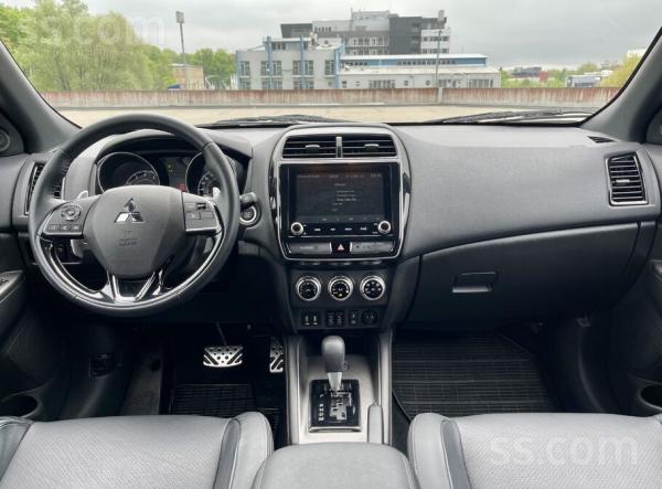 White Mitsubishi ASX 2021 in Riga, with an engine capacity of 2.00 L and mileage of 60 thousand km for 18950 €, photo 9 on AUTOMOTO.COM.LV
