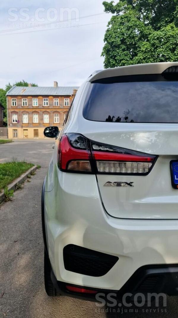 White Mitsubishi ASX 2021 in Riga, with an engine capacity of 2.00 L and mileage of 66 thousand km for 16300 €, photo 10 on AUTOMOTO.COM.LV