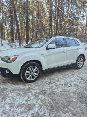 White Mitsubishi ASX 2010 in Vilnius, with an engine capacity of 1.80 L and mileage of 269 thousand km for 4499 €, photo 2 on AUTOMOTO.COM.LV