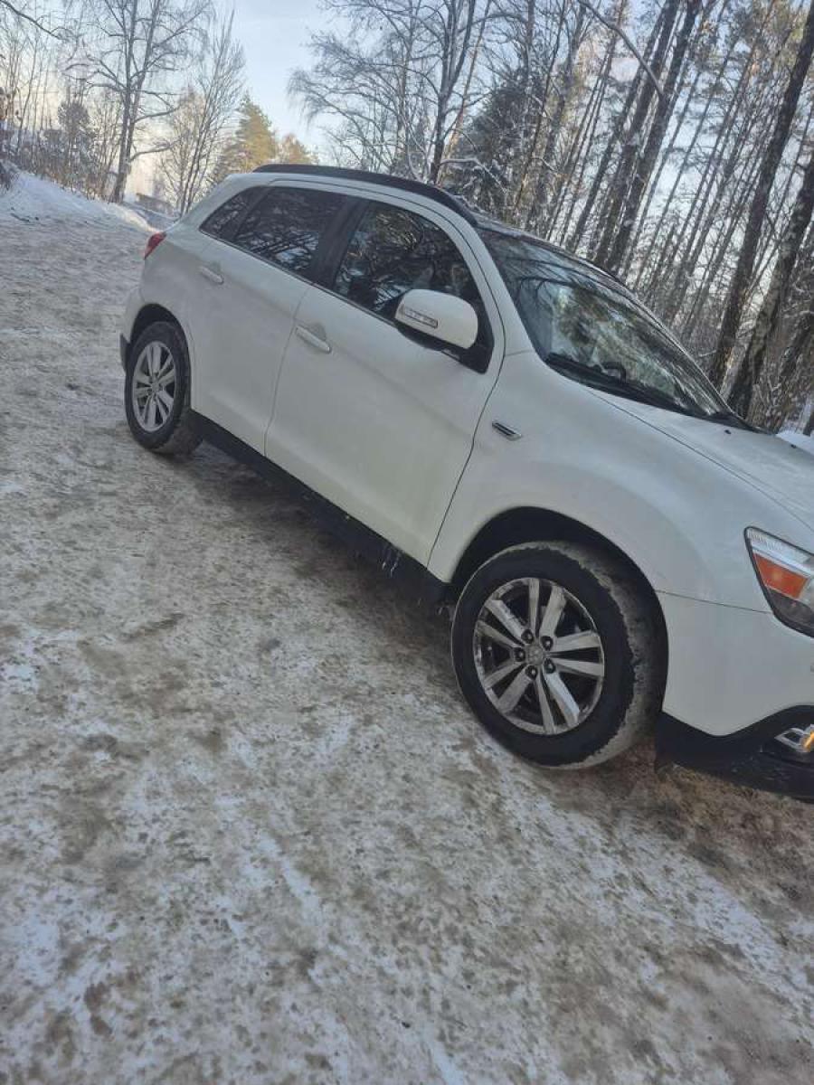 White Mitsubishi ASX 2010 in Vilnius, with an engine capacity of 1.80 L and mileage of 269 thousand km for 4499 €, photo 6 on AUTOMOTO.COM.LV