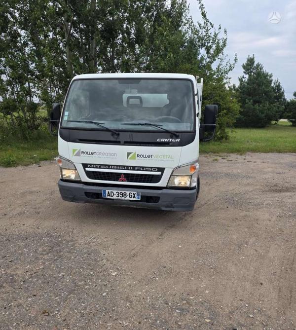 White Mitsubishi Canter 2009 in Taurage, with an engine capacity of 3.00 L and mileage of 224 thousand km for 9300 €, photo 4 on AUTOMOTO.COM.LV