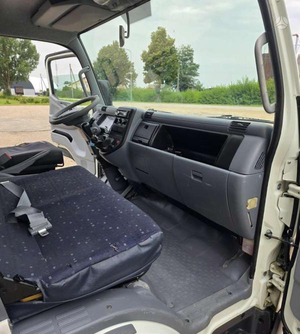 White Mitsubishi Canter 2009 in Taurage, with an engine capacity of 3.00 L and mileage of 224 thousand km for 9300 €, photo 11 on AUTOMOTO.COM.LV