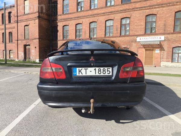 Black Mitsubishi Carisma 2001 in Daugavpils, with an engine capacity of 1.90 L and mileage of 370 thousand km for 650 €, photo 2 on AUTOMOTO.COM.LV