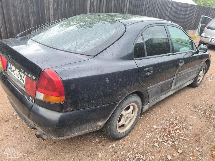 Melns Mitsubishi Carisma 1999 Klaipėda, ar dzinēja tilpumu 1.80 L un nobraukumu 353 tūkst. km par 650 €, foto 4 vietnē AUTOMOTO.COM.LV
