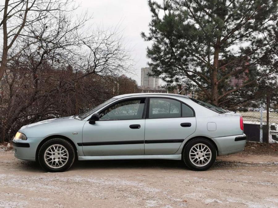 Blue Mitsubishi Carisma 2005 in Vilnius, with an engine capacity of 1.80 L and mileage of 250 thousand km for 550 €, photo 8 on AUTOMOTO.COM.LV