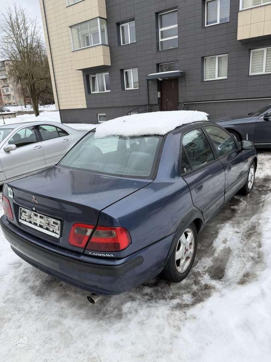 Blue Mitsubishi Carisma 1985 in Kaunas, with an engine capacity of 1.99 L and mileage of 225 thousand km for 799 €, photo 5 on AUTOMOTO.COM.LV
