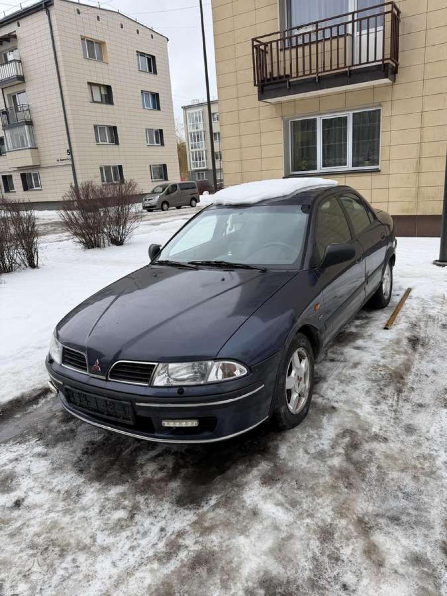 Blue Mitsubishi Carisma 2001 in Kaunas, with an engine capacity of 1.99 L and mileage of 225 thousand km for 799 €, photo 3 on AUTOMOTO.COM.LV