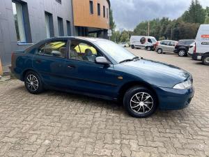 Green Mitsubishi Carisma 1998 in Vilnius, with an engine capacity of 1.60 L and mileage of 123 thousand km for 1290 €, photo 3 on AUTOMOTO.COM.LV