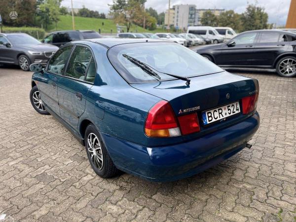 Green Mitsubishi Carisma 1998 in Vilnius, with an engine capacity of 1.60 L and mileage of 123 thousand km for 1290 €, photo 6 on AUTOMOTO.COM.LV