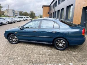 Green Mitsubishi Carisma 1998 in Vilnius, with an engine capacity of 1.60 L and mileage of 123 thousand km for 1290 €, photo 7 on AUTOMOTO.COM.LV