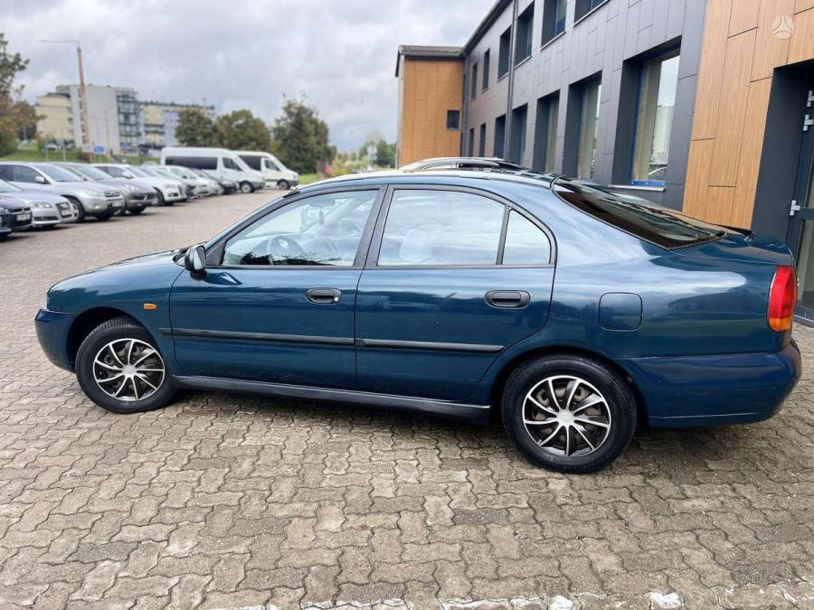 Green Mitsubishi Carisma 1998 in Vilnius, with an engine capacity of 1.60 L and mileage of 123 thousand km for 1290 €, photo 7 on AUTOMOTO.COM.LV