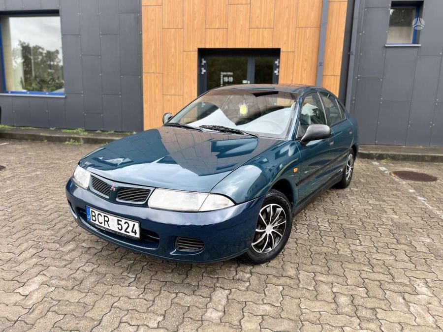 Green Mitsubishi Carisma 1998 in Vilnius, with an engine capacity of 1.60 L and mileage of 123 thousand km for 1290 €, photo 9 on AUTOMOTO.COM.LV
