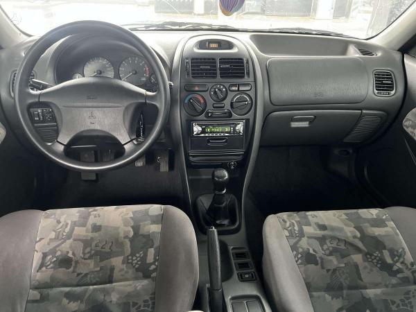 Green Mitsubishi Carisma 1998 in Vilnius, with an engine capacity of 1.60 L and mileage of 123 thousand km for 1290 €, photo 10 on AUTOMOTO.COM.LV
