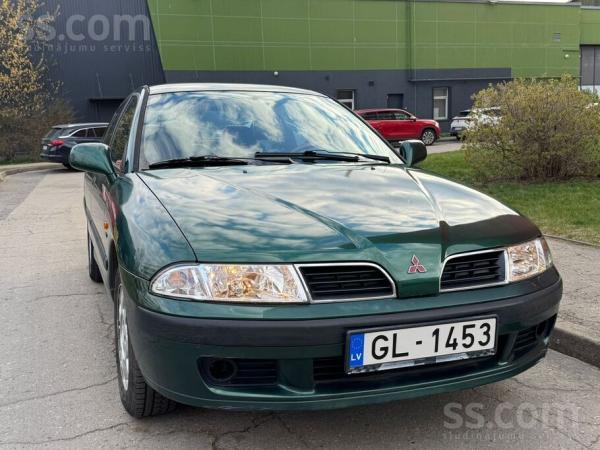 Зеленый Мицубиси Харизма 1999 в Рига, объемом двигателя 1.80 л и пробегом 260 тыс. км за 1450 €, фото 1 на AUTOMOTO.COM.LV