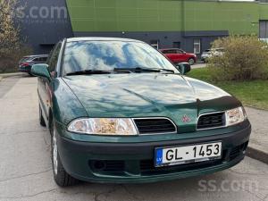 Green Mitsubishi Carisma 1999 in Riga, with an engine capacity of 1.80 L and mileage of 260 thousand km for 1450 €, photo  on AUTOMOTO.COM.LV
