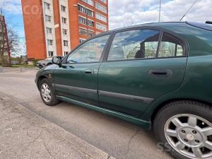 Green Mitsubishi Carisma 1999 in Riga, with an engine capacity of 1.80 L and mileage of 260 thousand km for 1450 €, photo 3 on AUTOMOTO.COM.LV