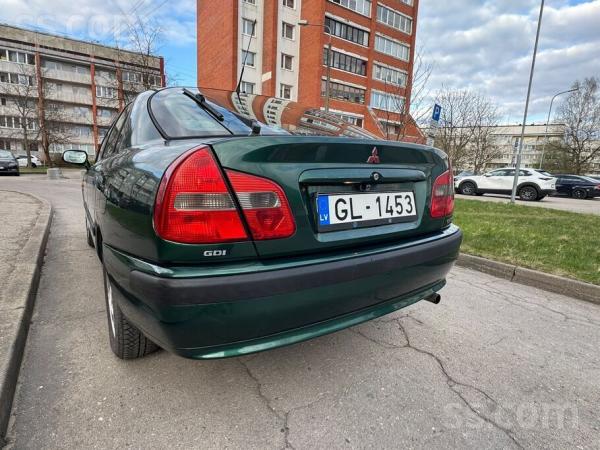 Зеленый Мицубиси Харизма 1999 в Рига, объемом двигателя 1.80 л и пробегом 260 тыс. км за 1450 €, фото 4 на AUTOMOTO.COM.LV