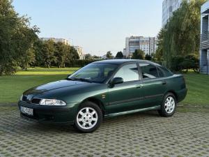 Green Mitsubishi Carisma 1999 in Riga, with an engine capacity of 1.80 L and mileage of 259 thousand km for 800 €, photo  on AUTOMOTO.COM.LV
