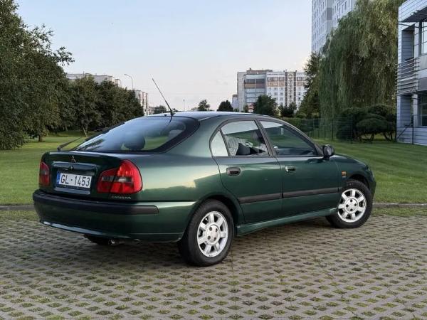 Green Mitsubishi Carisma 1999 in Riga, with an engine capacity of 1.80 L and mileage of 259 thousand km for 800 €, photo 5 on AUTOMOTO.COM.LV