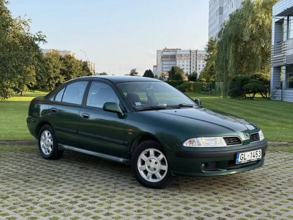 Green Mitsubishi Carisma 1999 in Riga, with an engine capacity of 1.80 L and mileage of 259 thousand km for 800 €, photo 7 on AUTOMOTO.COM.LV