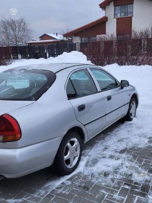 Grey Mitsubishi Carisma 1996 in Klaipeda, with an engine capacity of 1.60 L and mileage of 189 thousand km for 900 €, photo 4 on AUTOMOTO.COM.LV