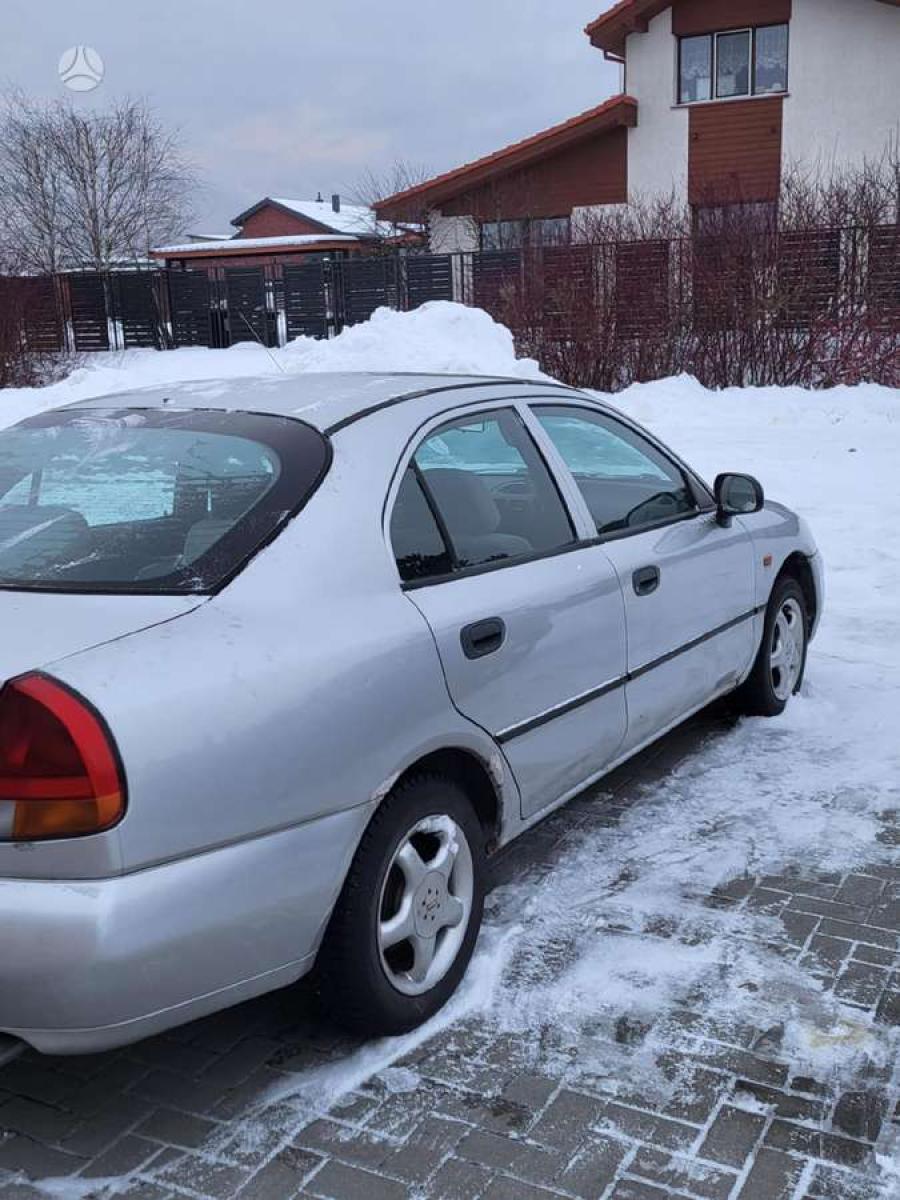 Grey Mitsubishi Carisma 1996 in Klaipeda, with an engine capacity of 1.60 L and mileage of 189 thousand km for 900 €, photo 4 on AUTOMOTO.COM.LV