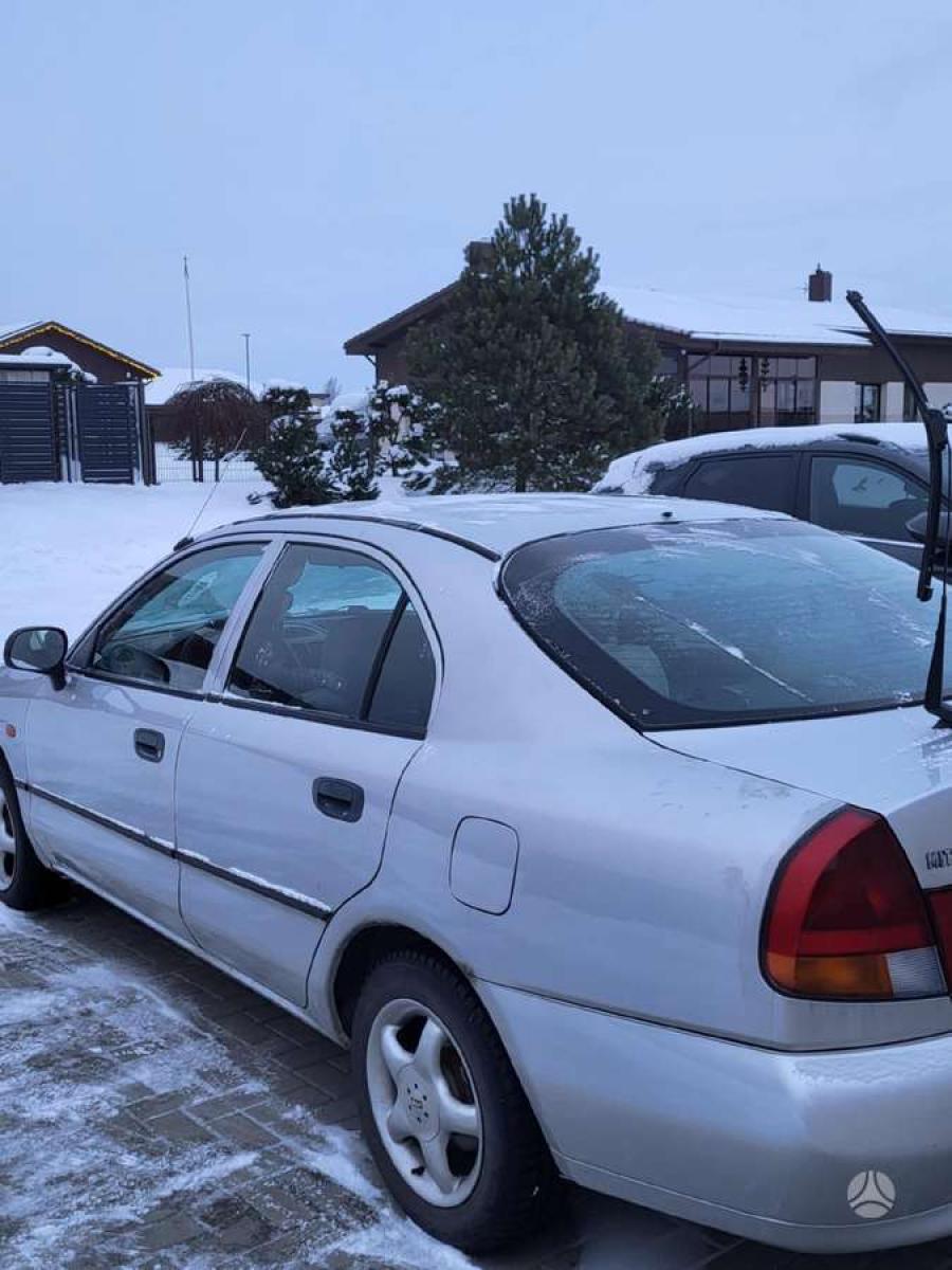 Grey Mitsubishi Carisma 1996 in Klaipeda, with an engine capacity of 1.60 L and mileage of 189 thousand km for 900 €, photo 5 on AUTOMOTO.COM.LV