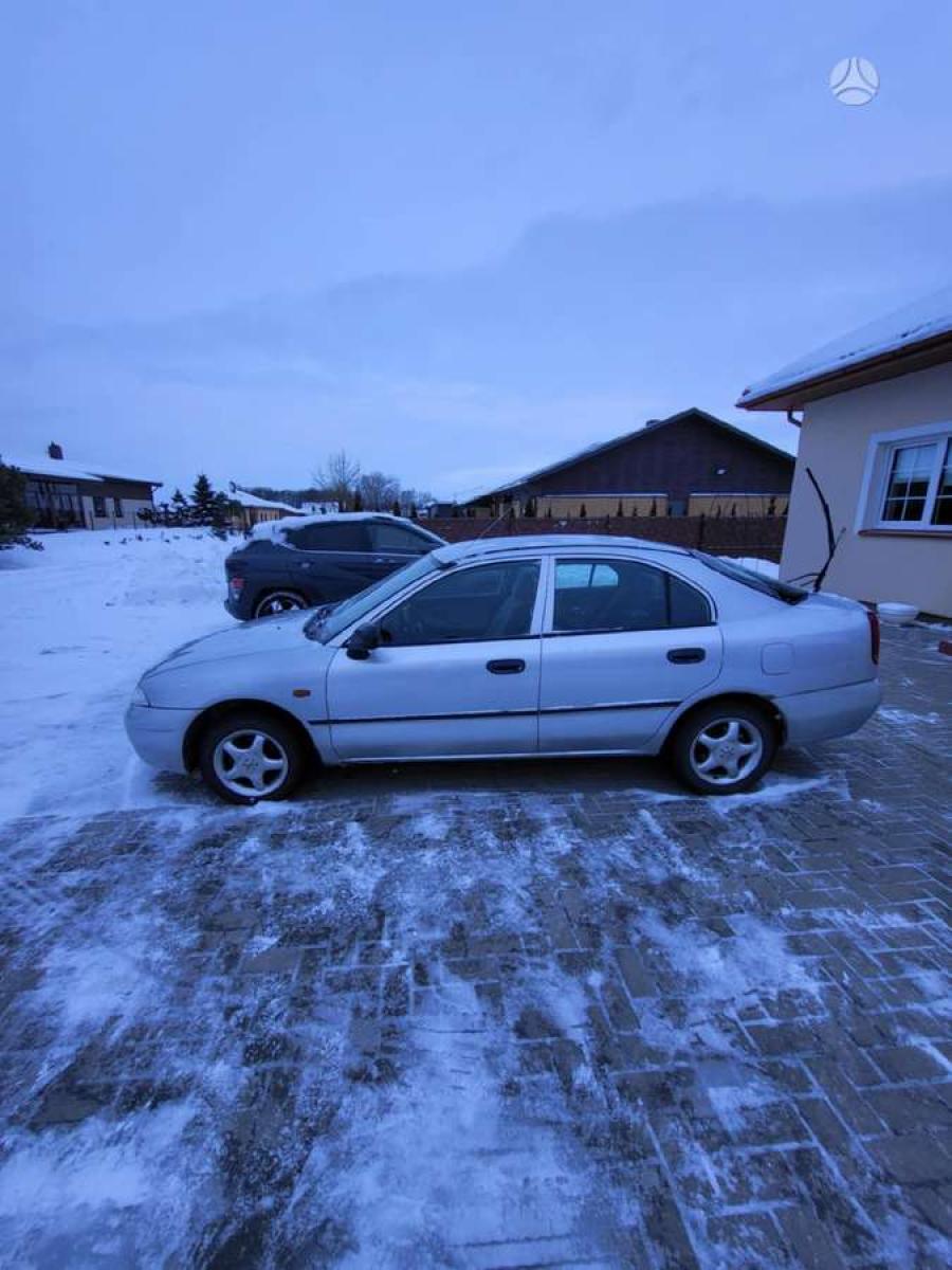Grey Mitsubishi Carisma 1996 in Klaipeda, with an engine capacity of 1.60 L and mileage of 189 thousand km for 900 €, photo 6 on AUTOMOTO.COM.LV