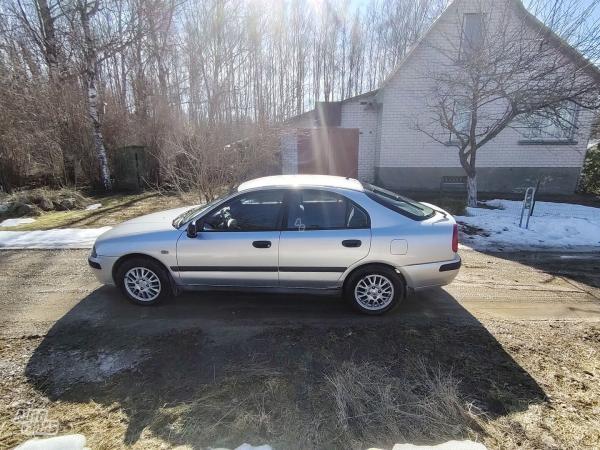 Pelēks Mitsubishi Carisma 2002 Radviliškis, ar dzinēja tilpumu 1.80 L un nobraukumu 172 tūkst. km par 600 €, foto 2 vietnē AUTOMOTO.COM.LV