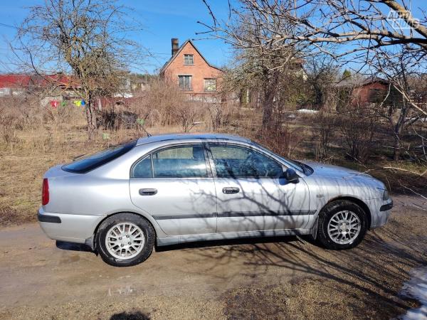 Pelēks Mitsubishi Carisma 2002 Radviliškis, ar dzinēja tilpumu 1.80 L un nobraukumu 172 tūkst. km par 600 €, foto 3 vietnē AUTOMOTO.COM.LV